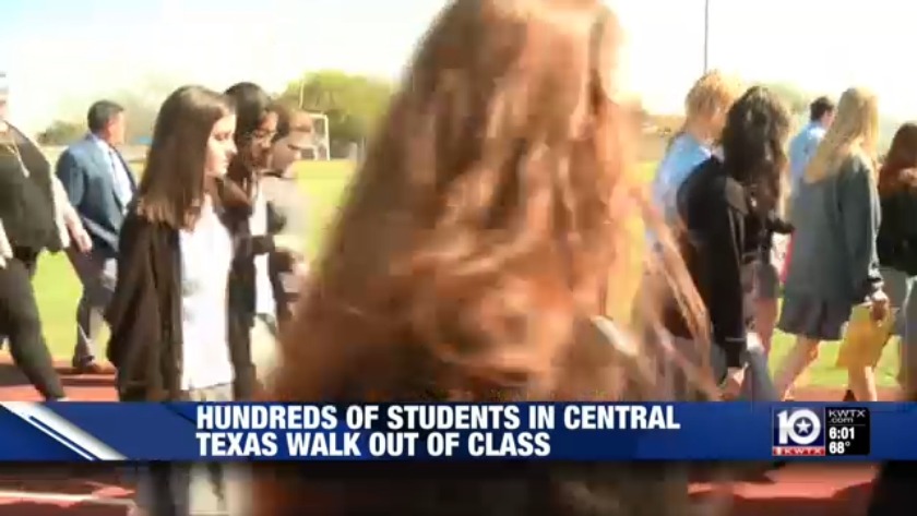 Hundreds of local students walk out of class to call for new gun laws