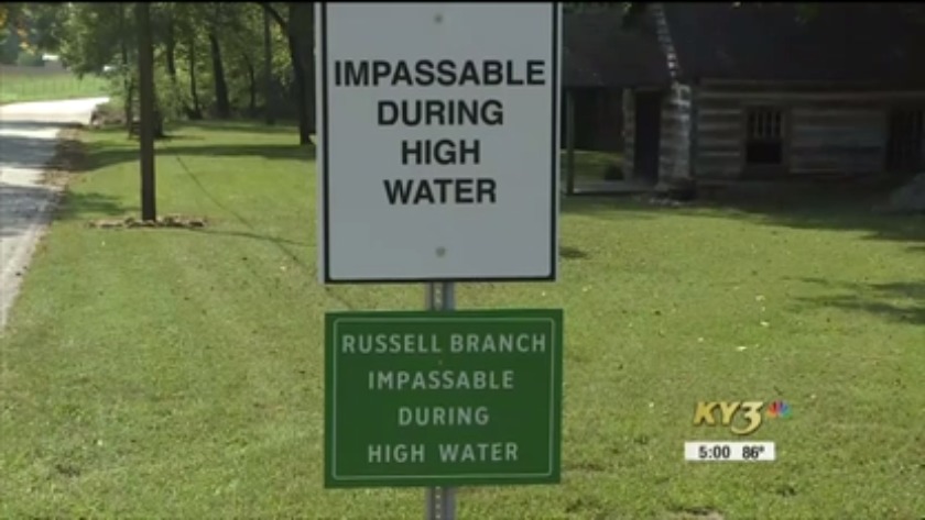 High water warning signs appear near bridge where Greene County deputy ...